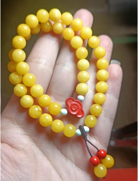 鸡油黄蜜蜡的功效与作用_佩戴禁忌有哪些-第3张图片-山城妙识 鸡油黄蜜蜡的功效与作用_佩戴禁忌有哪些-第3张图片-山城妙识